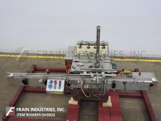 Filamatic #H-Z-300, automatic, 4 head piston filler, with 3-1/2" wide x ...