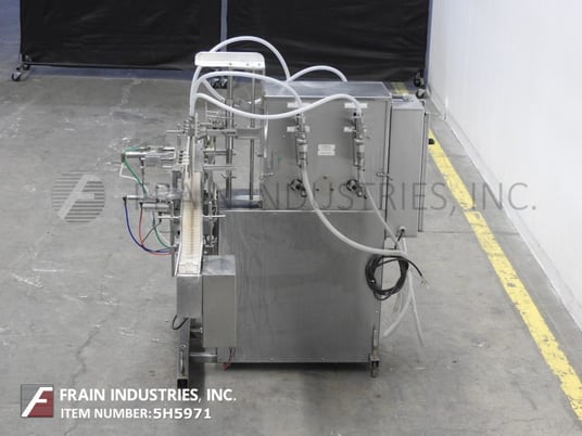 Filamatic #S-16, 4 head inline piston filler, 12-60 bottles/minute, 60 ...