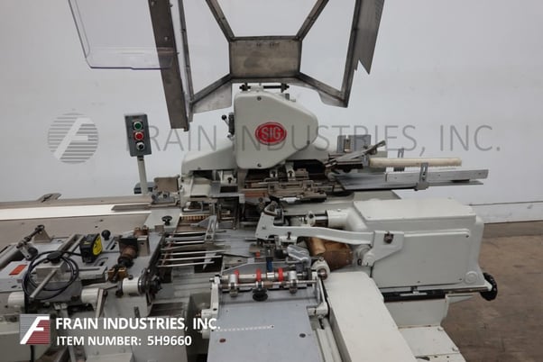 Sig #C-Bar, chocolate foil and paper tablet wrapping machine r, mounted ...