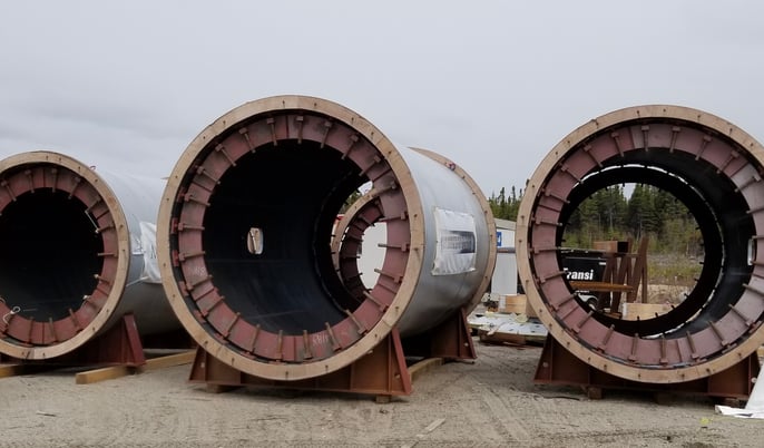 10.5' x 18.5' Outotec Ball mill with 1000 HP, cast mill heads, unused ...
