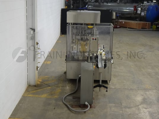 MRM Elgin #RFL, automatic, 12 head, Stainless Steel rotary, fill to ...