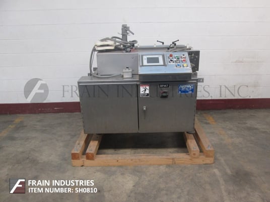 Arpac #70LS, lugged infeed conveyor, with dual star wheel indexing, AB ...