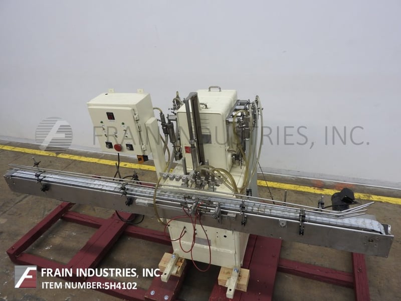 Filamatic #DAB-16-4, automatic, inline, 8-head piston filler, with 3-1/ ...