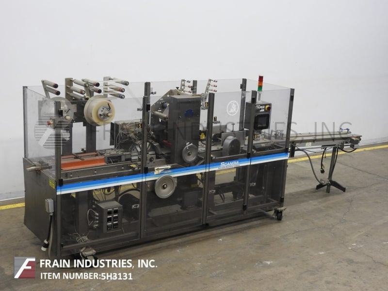 Scandia #720, automatic, turret type over wrapping machine, 50-350 CPM ...