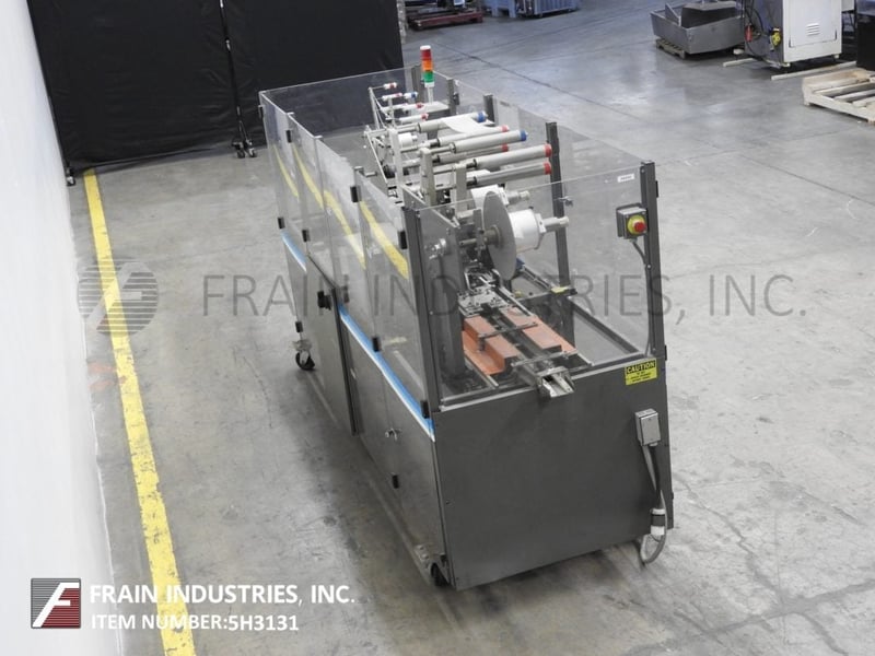 Scandia #720, automatic, turret type over wrapping machine, 50-350 CPM ...