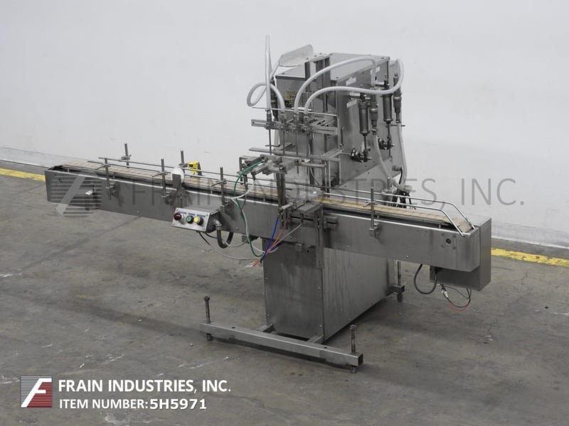 Filamatic #S-16, 4 head inline piston filler, 12-60 bottles/minute, 60 ...