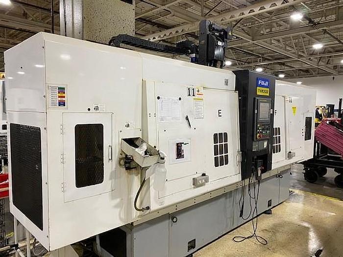 Fuji #TNW3500TR, twin spindle twin turret CNC lathe w/gantry load, 8 ...