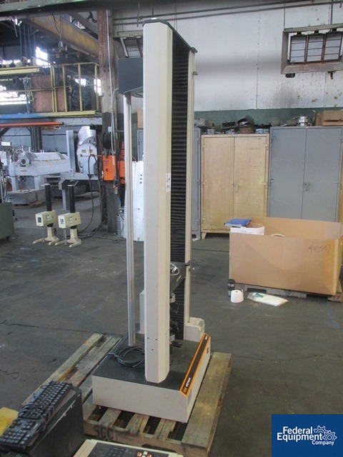 Instron #4200, Sys.ID #4201C3311, jaws & (2) load cells, last ...