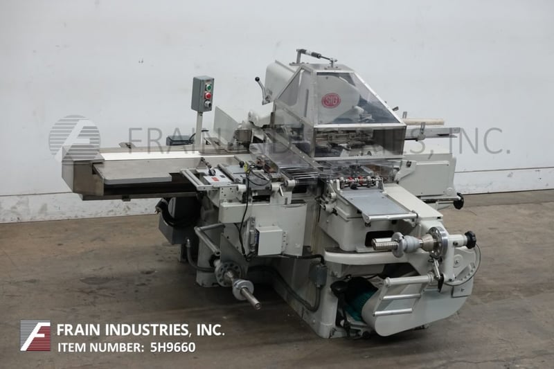 Sig #C-Bar, chocolate foil and paper tablet wrapping machine r, mounted ...