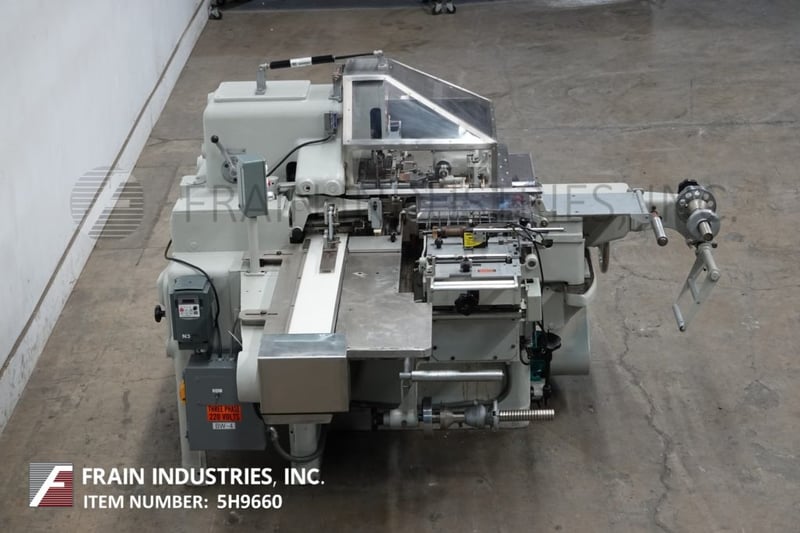 Sig #C-Bar, chocolate foil and paper tablet wrapping machine r, mounted ...