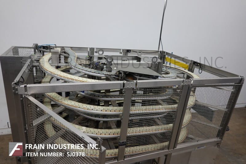 Hartness #6400, dynac pressureless accumul, with 4" wide table top ...