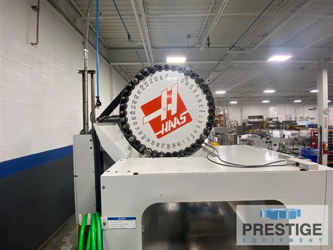 Haas #VF-4B, 50" X, Cat 40,10000 RPM, 30 HP, 40 side mount tool changer, chip auger, pre-wired ...