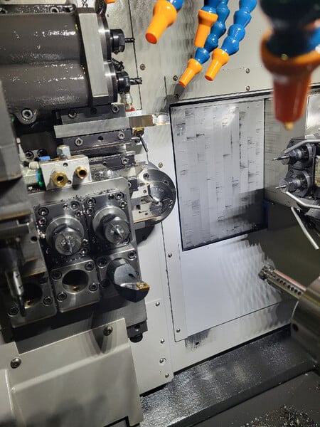 Tsugami #B038T, 12-Axis, 1-1/2" cap., sliding headstock, sub spindle, 8 station turret, bar feed ...