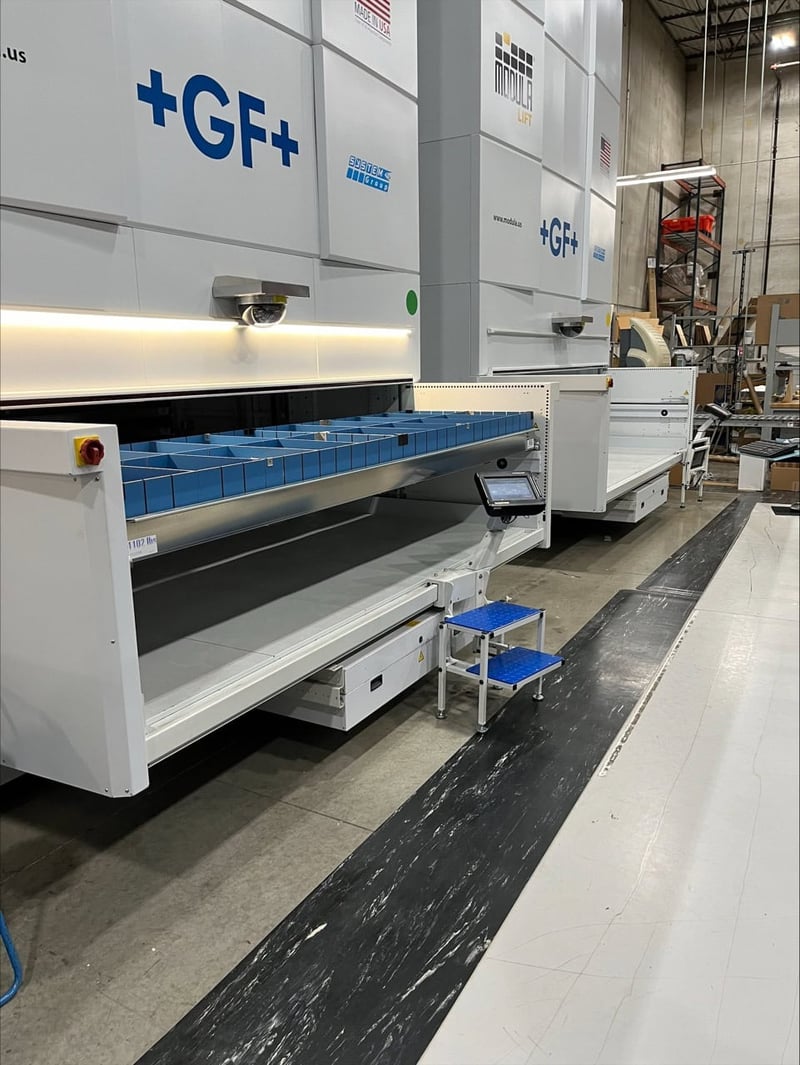 Modula #Mx50d, vertical lift module, trays, 122" W x 33.7" D, WMS base ...