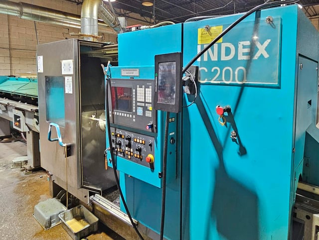 Index #C200, cnc lathe, 65" mm bar, 5k RPM, C200-4D Control, conveyors ...