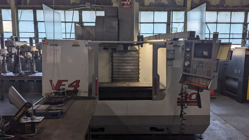 Haas #VF-4, 4 axis CNC vertical machining center, 50" X, 20" Y, 25" Z, 10000 RPM, 30 HP, side ...