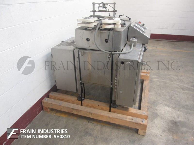 Arpac #70LS, lugged infeed conveyor, with dual star wheel indexing, AB ...