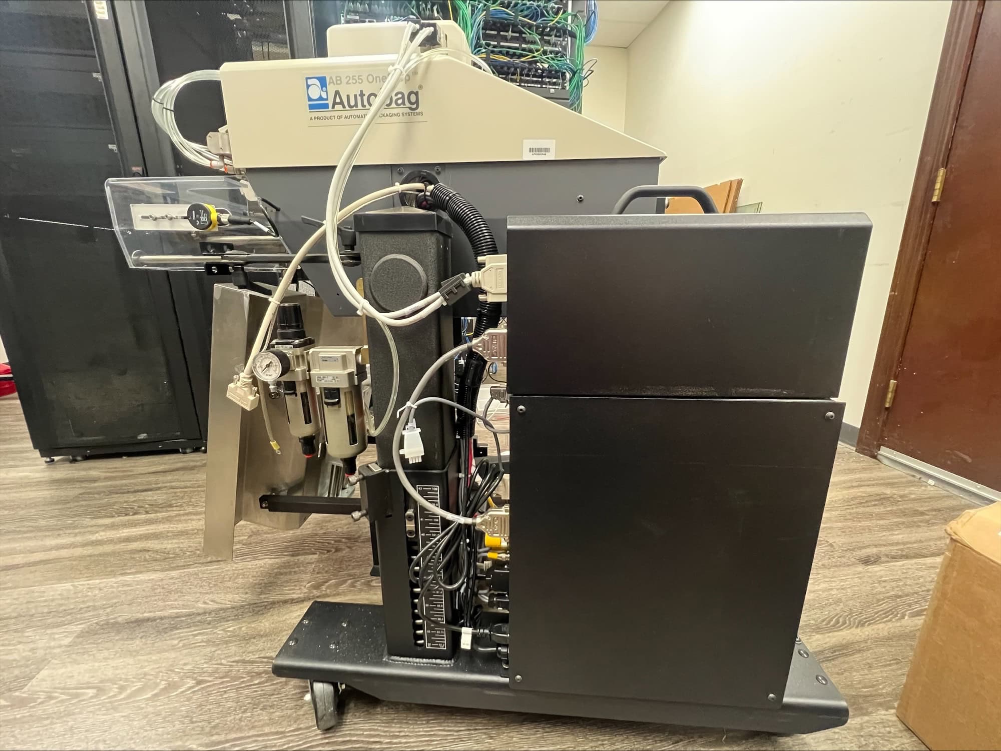 Autobag #AB-255-OneStep, flexible wide bagging system for fulfillment & short run packaging ...